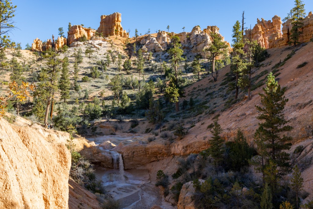 Mossy Cave Waterfall - a small cascade in Bryce Canyon | Hiking the World