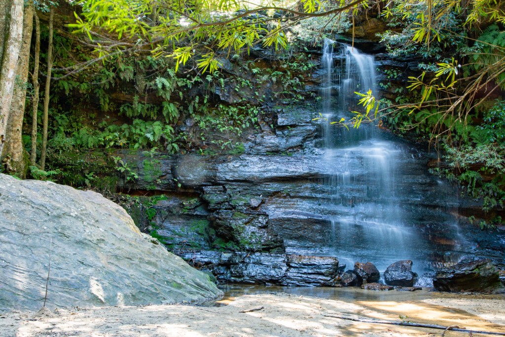 Federal Falls - a picturesque Lawson waterfall with a sandy beach ...